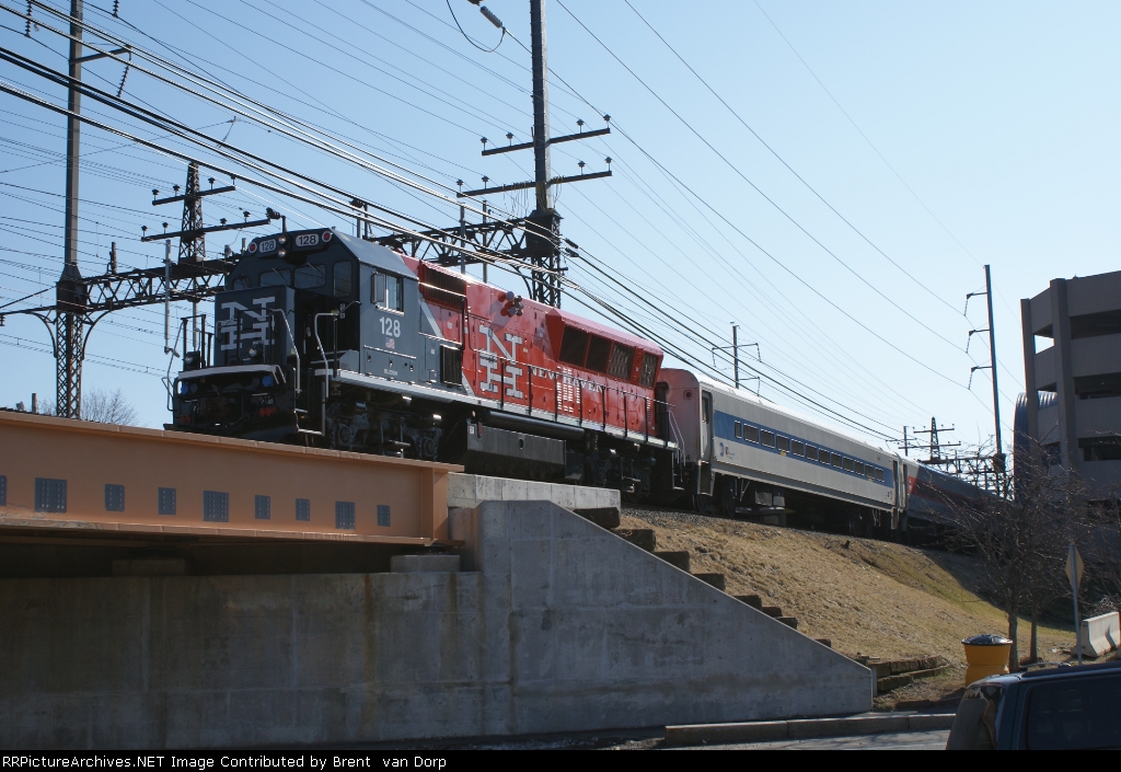 CDOT 128 heads up train 6834 in SoNo